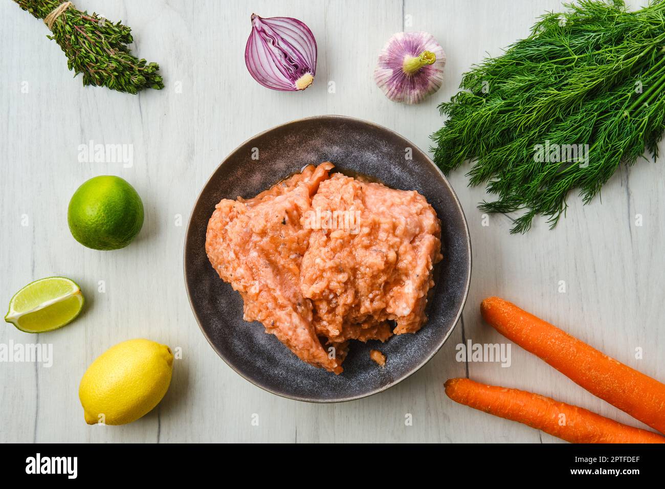 Top view of plate with minced salmon, spice and citrus Stock Photo - Alamy