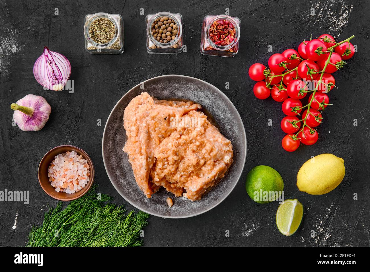 Top view of plate with minced salmon, spice and citrus Stock Photo - Alamy