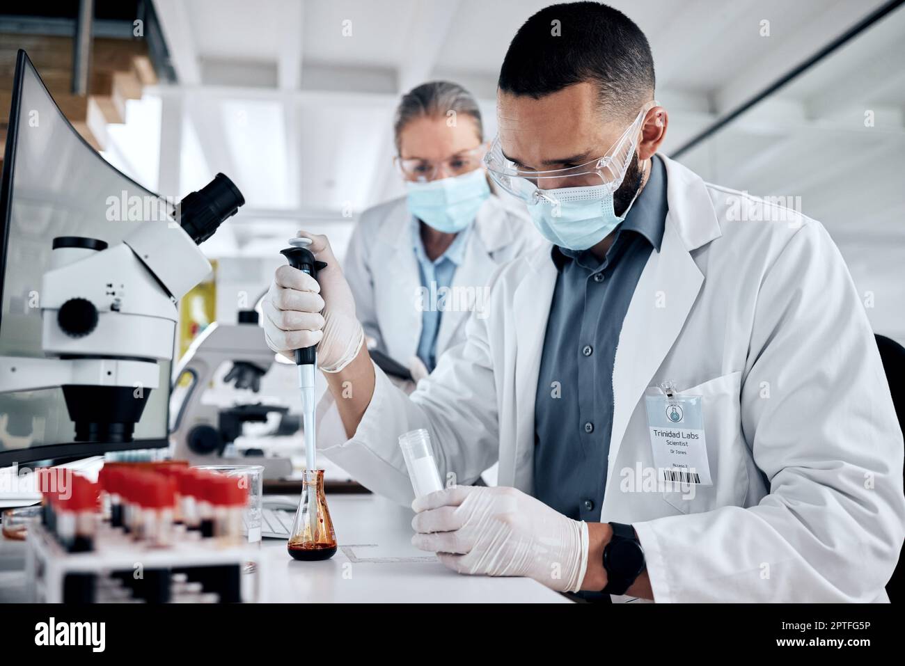 Scientist, blood sample and dna analysis, laboratory research and ...