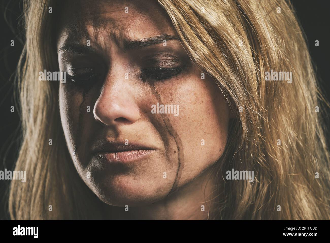 Sad, depression and woman crying on dark studio background for mental ...