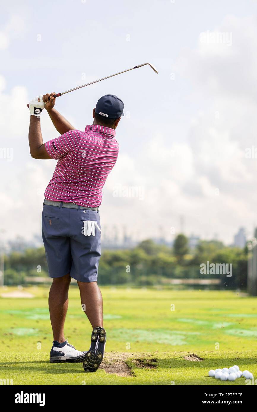 Anirban Lahiri of Crushers GC hits his shot on the driving range during ...