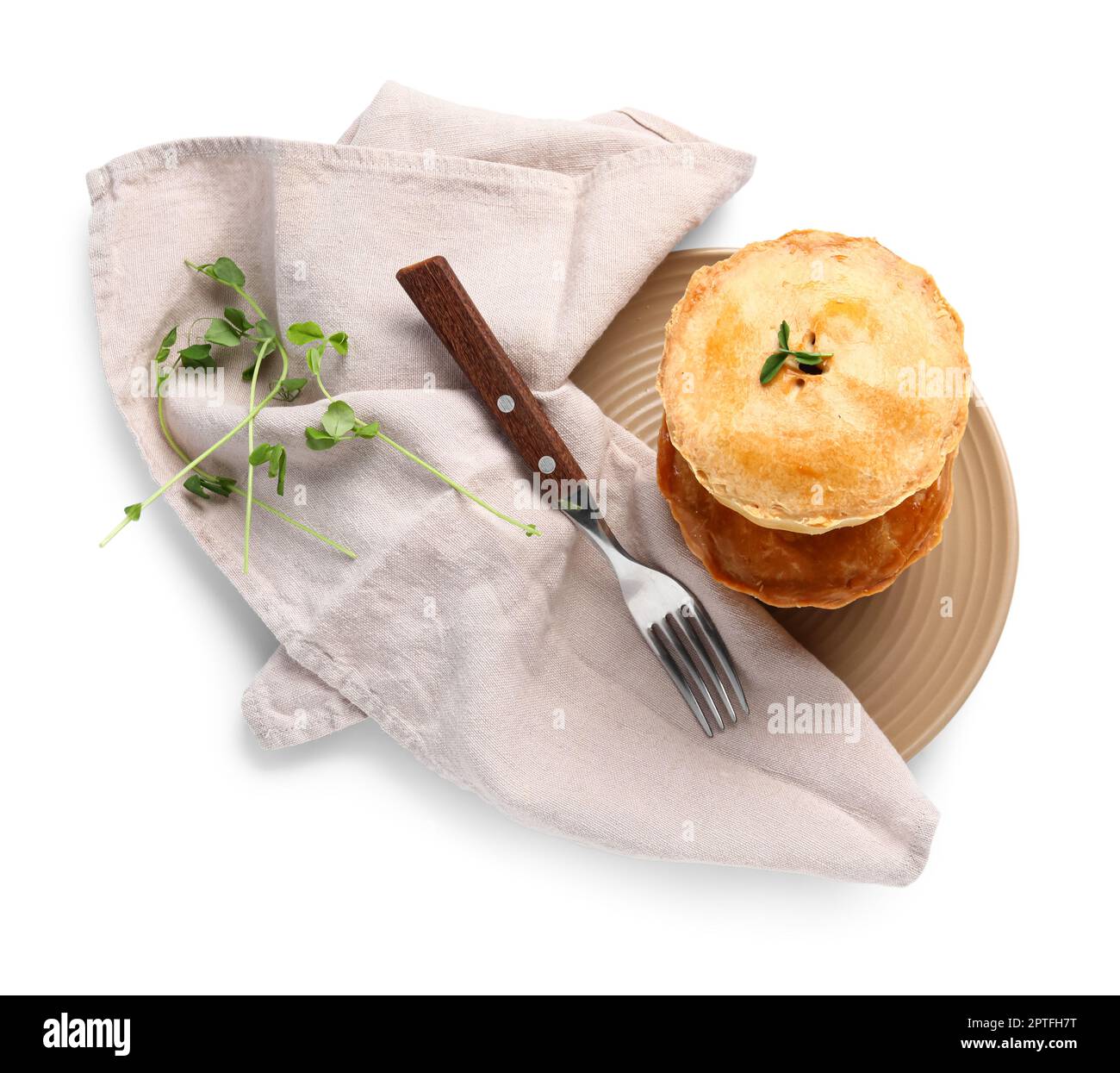 Plate with tasty meat pot pies on white background Stock Photo - Alamy