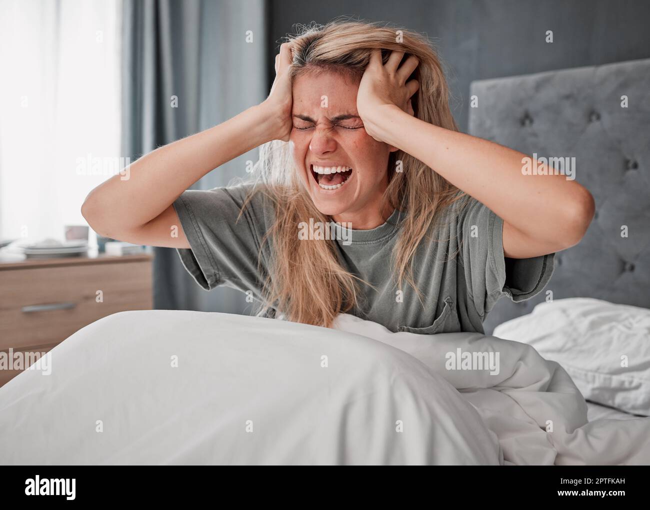 Girl screaming in bed hi-res stock photography and images - Alamy