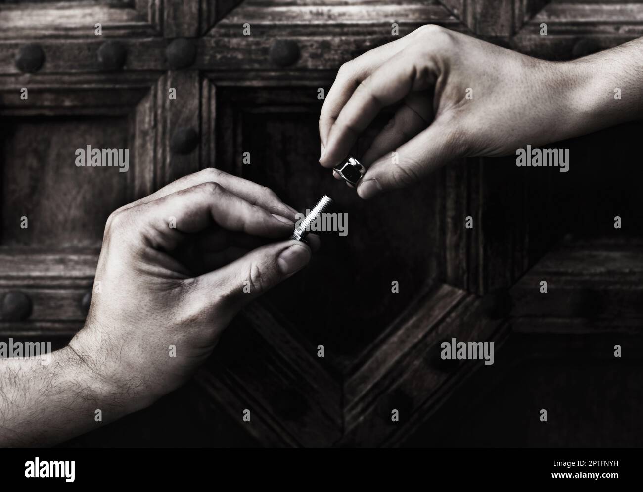 Hands holding nuts bolts hi-res stock photography and images - Alamy