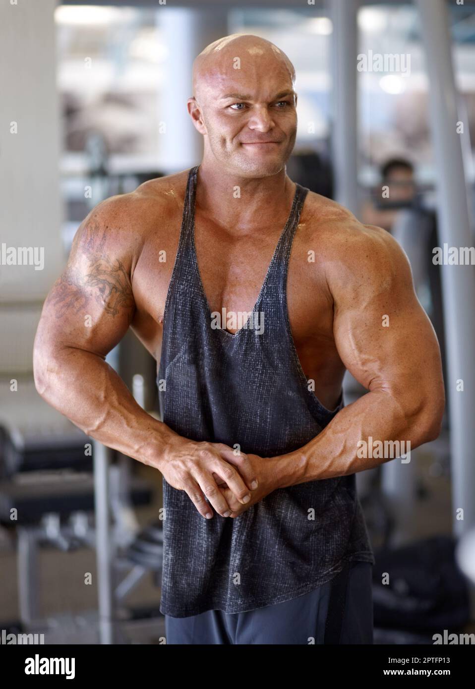 Well built man showing muscles hi-res stock photography and images - Alamy