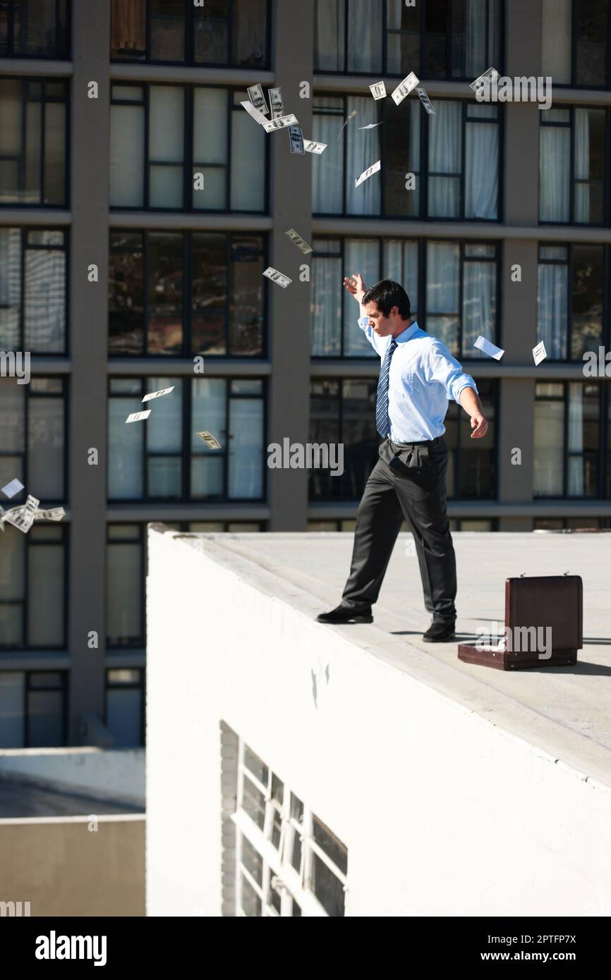 Person throwing money in the air hi-res stock photography and images ...