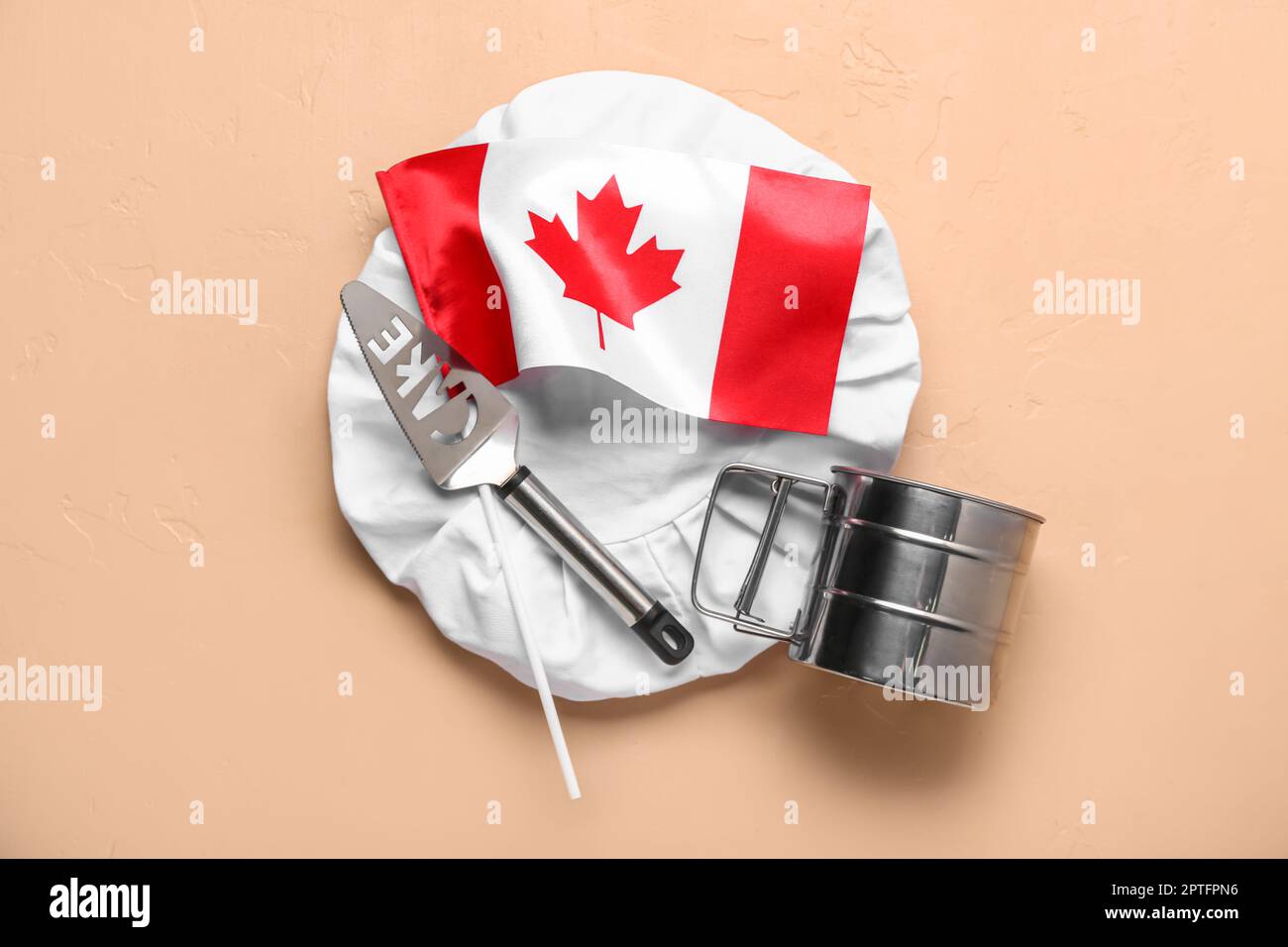 Canadian flag with chef's hat and utensils on beige background Stock ...