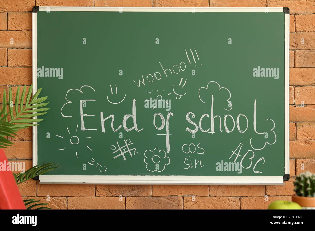 Blackboard with text END OF SCHOOL and drawings in classroom Stock ...