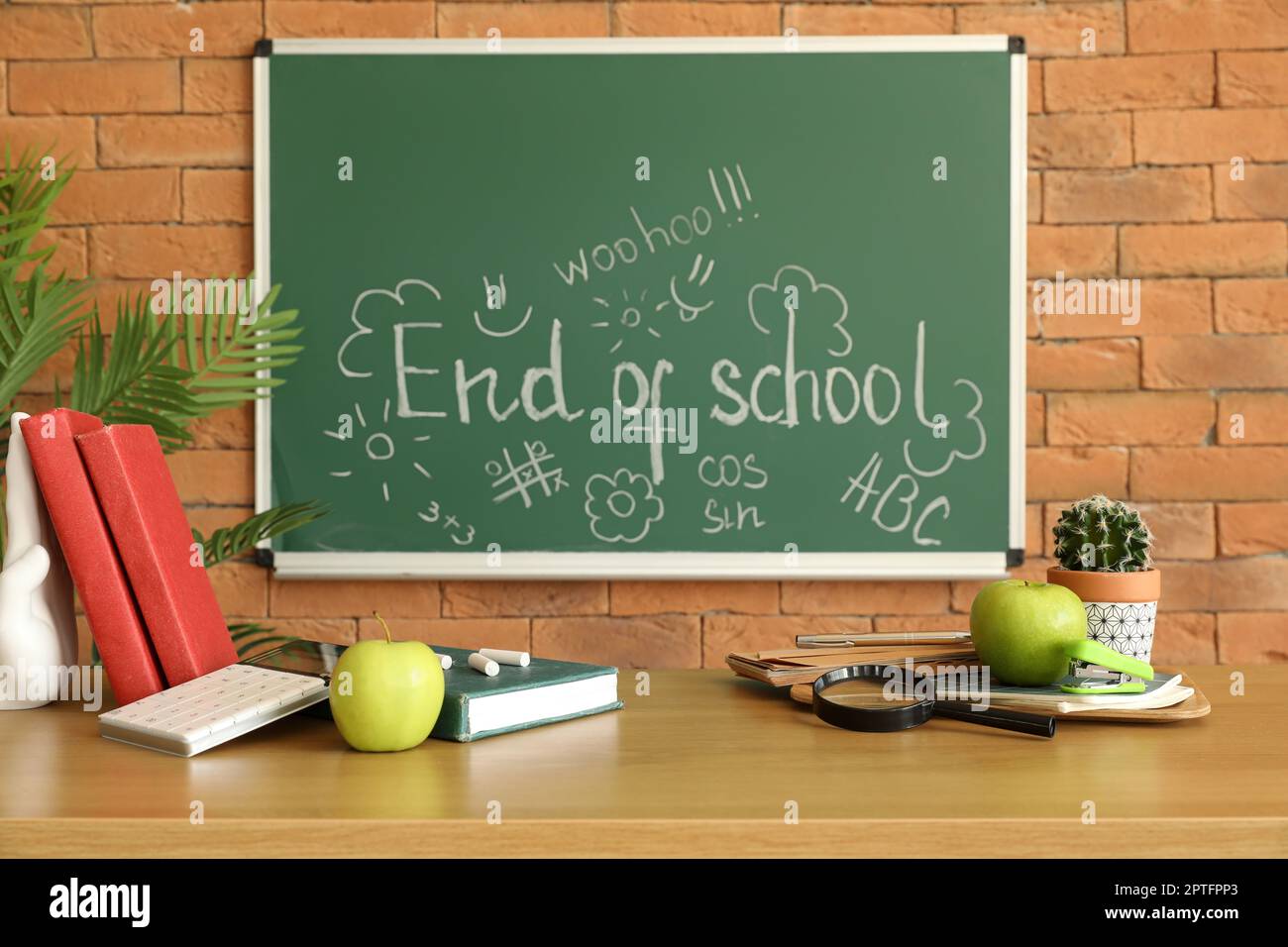 Blackboard with text END OF SCHOOL and drawings in classroom Stock ...