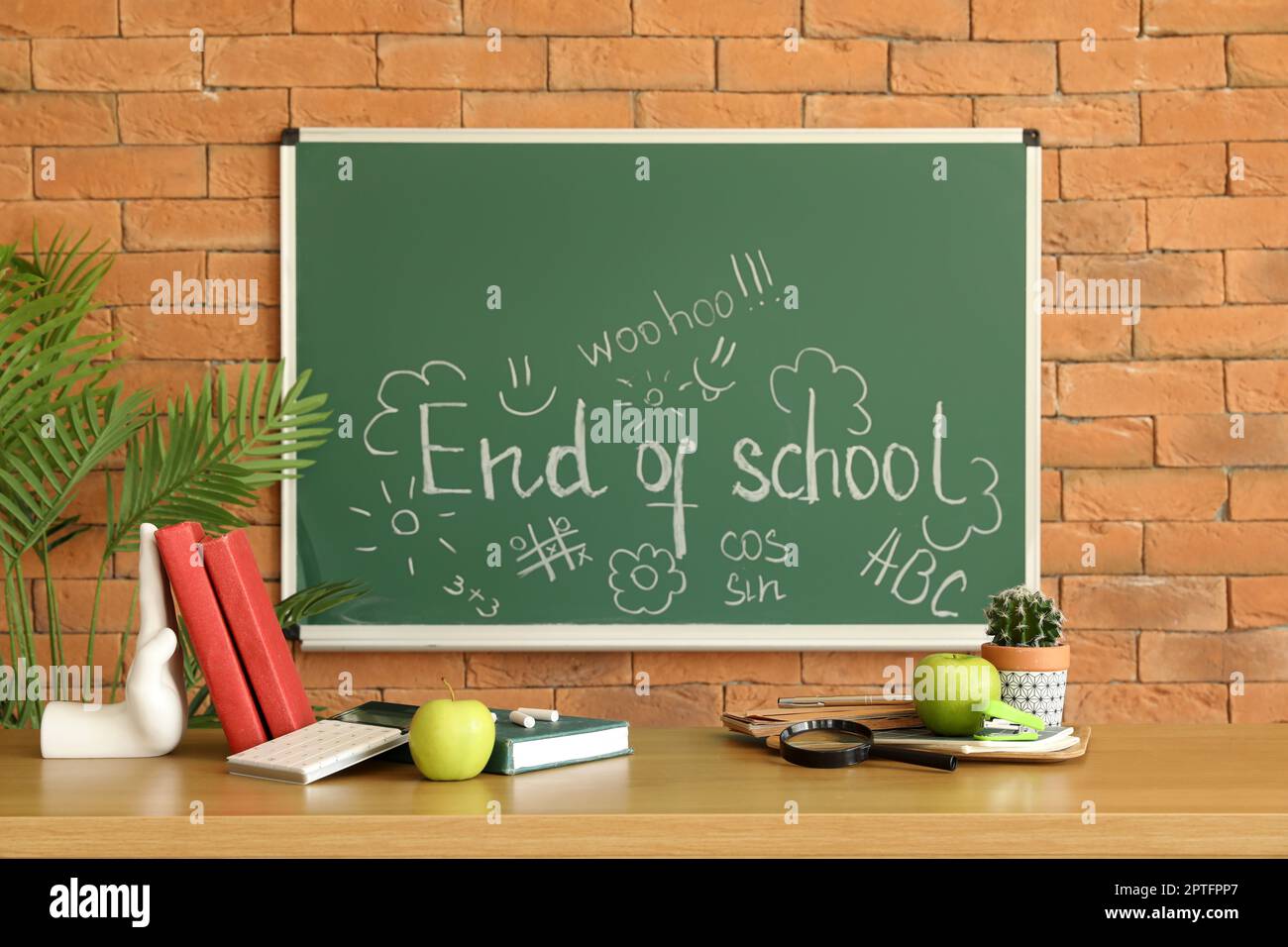 Blackboard with text END OF SCHOOL and drawings in classroom Stock ...