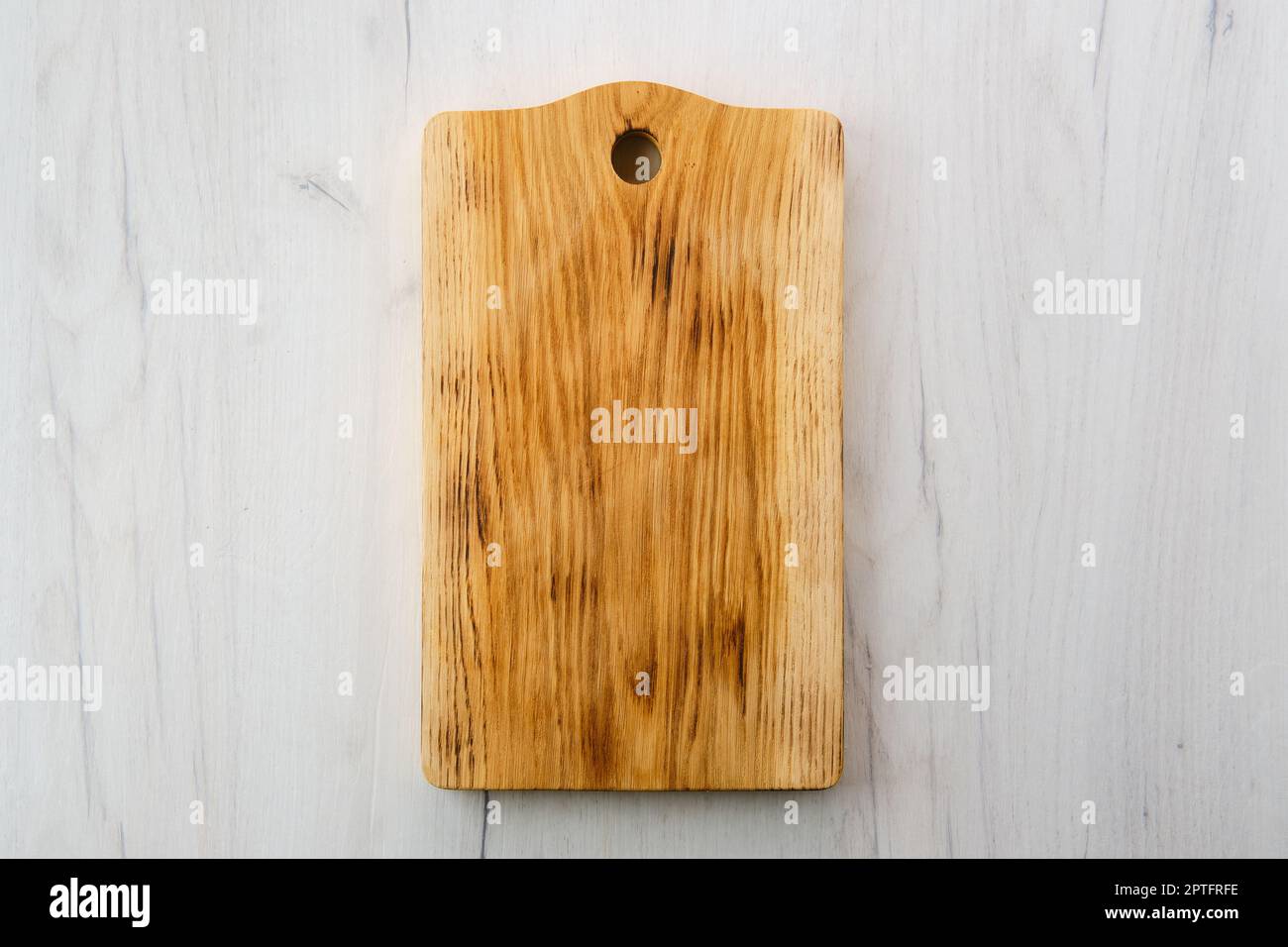 Overhead view of wooden cutting board Stock Photo - Alamy