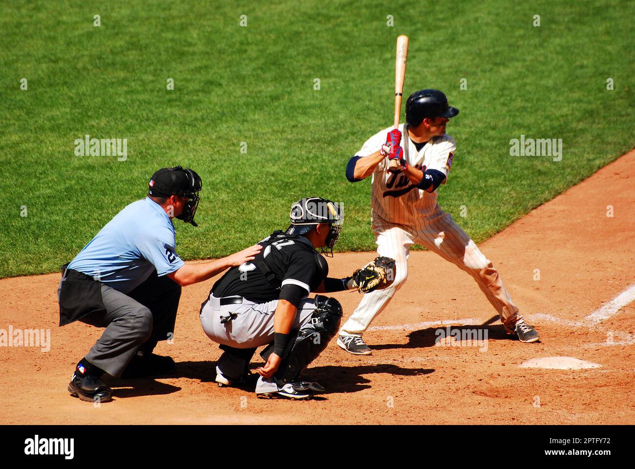 A batter for the Minnesota Twins stands at the plate, ready for the ...