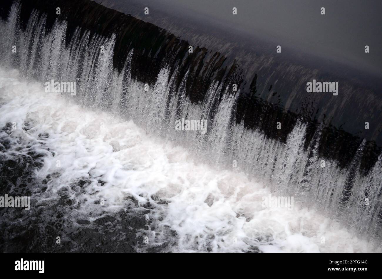 A picture of the flowing water. The dam is designed to regulate the ...