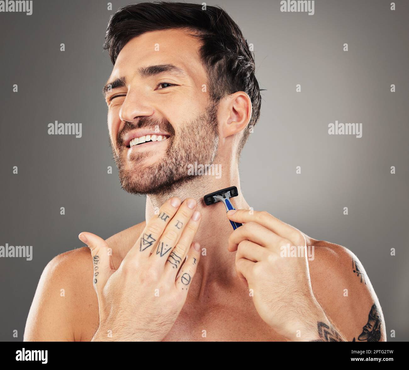 Beard, smile and man shaving face for clean, healthy and beauty skin ...