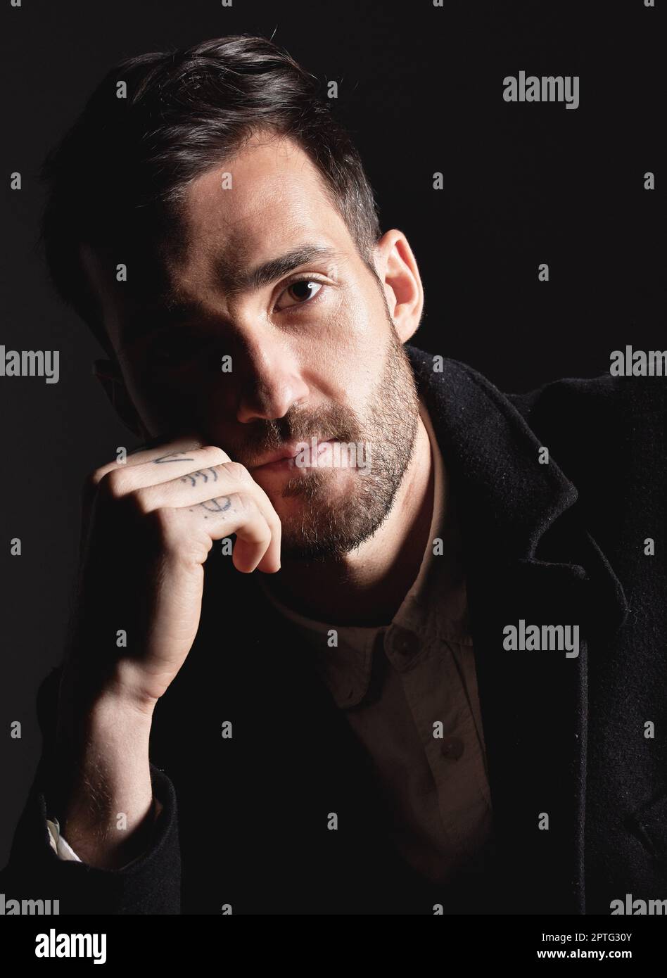 Shadow, fashion and dark portrait of man with confident attitude ...