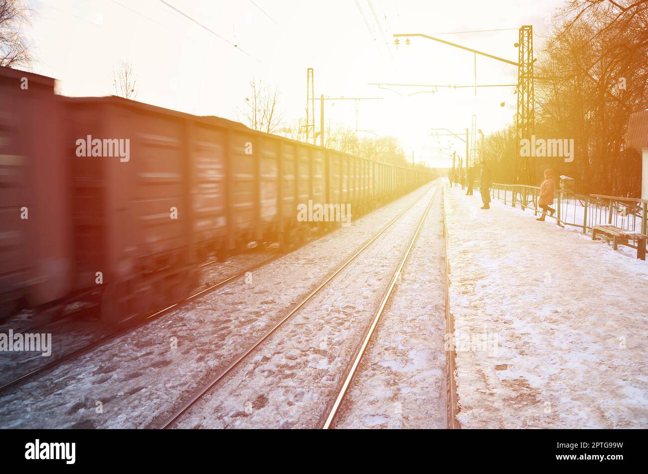 Photo of bright and beautiful sunset on a cloudy sky in cold winter ...