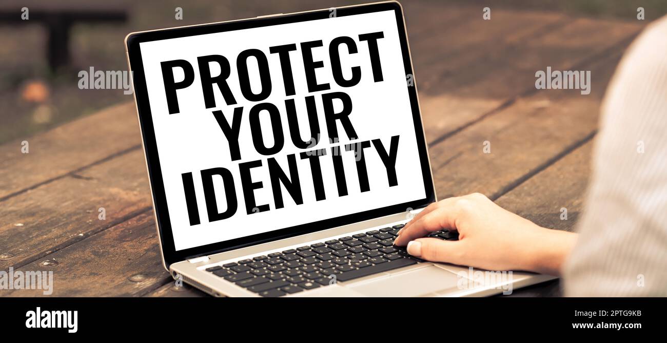 Sign displaying Protect Your Identity, Word Written on secure from data ...
