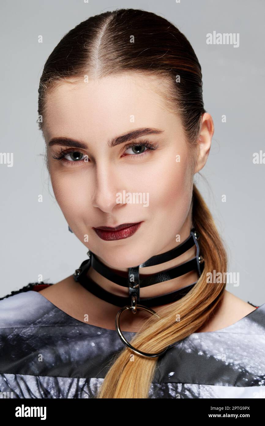 Closeup portrait of fashion model with perfect skin, dark matt lipstick ...