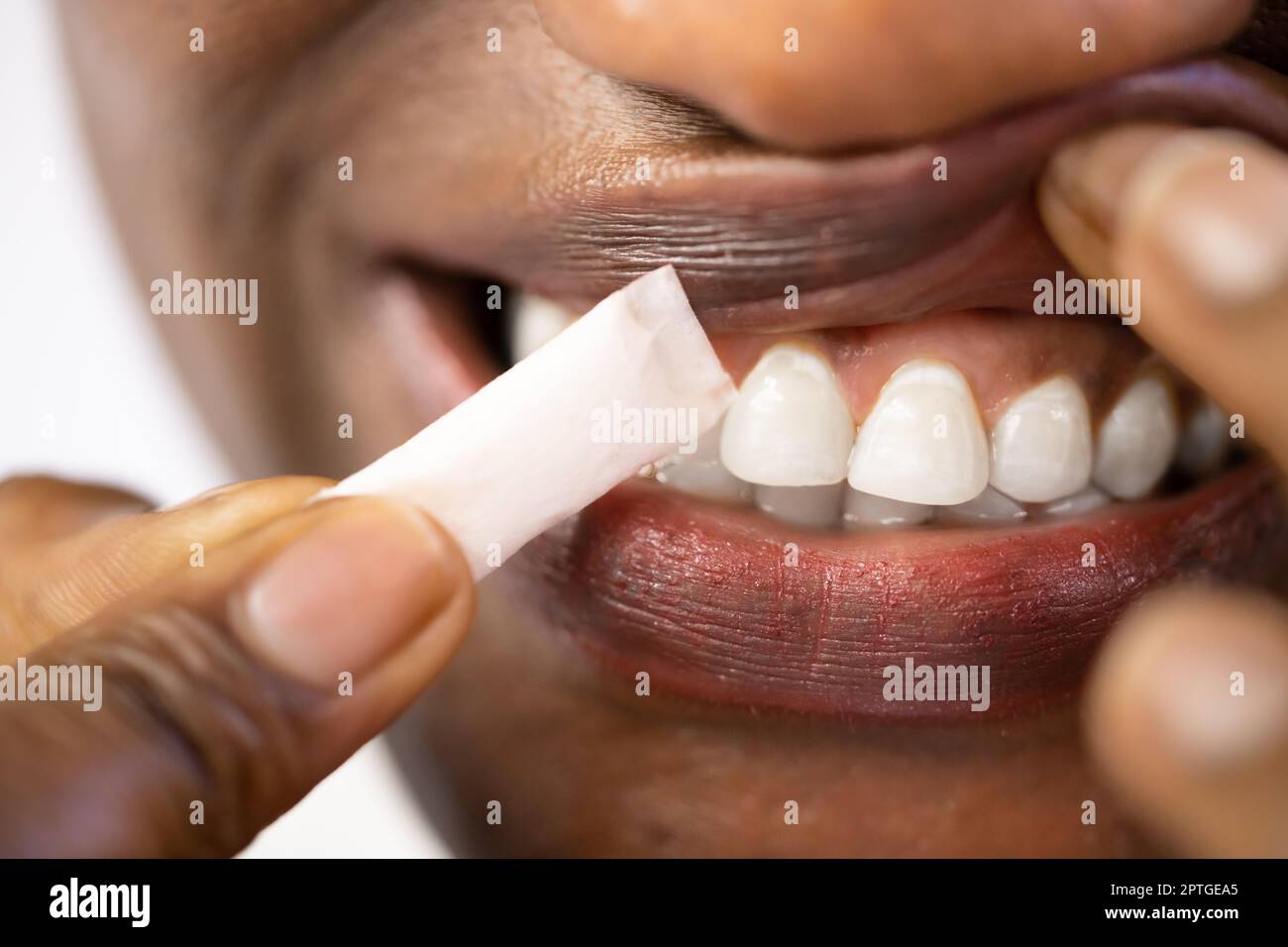 Woman Chewing Wet Moist Nicotine Tobacco Snus Product Stock Photo - Alamy
