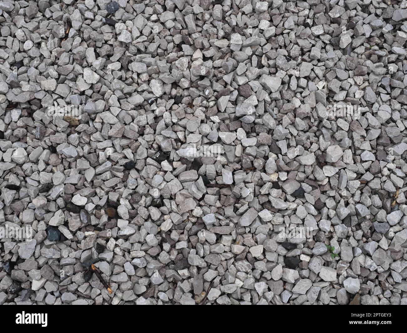 white gravel texture useful as a background Stock Photo - Alamy