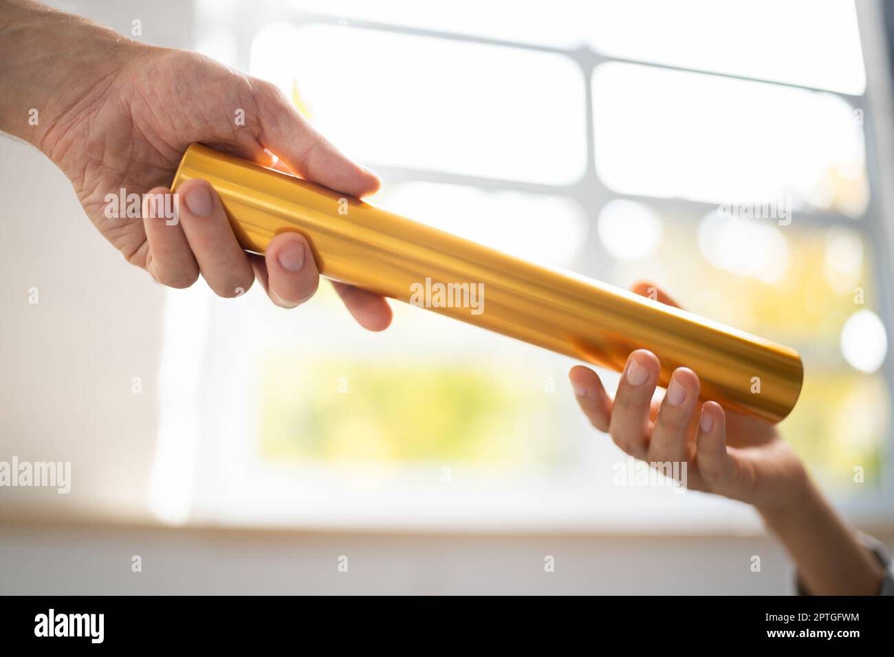 Business Woman And Woman Relay Baton Handover And Pass Stock Photo - Alamy