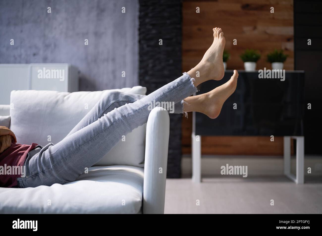 Lazy Woman Sleeping On Couch Or Sofa Stock Photo - Alamy