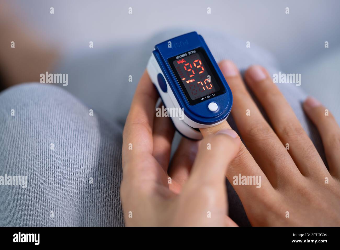 African Hand Pulse Heart Rate And Oximeter Stock Photo - Alamy