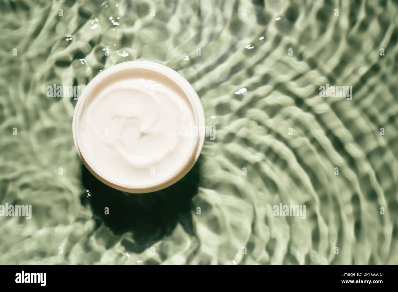 White plastic jar pot of facial and body cream gel collagen for anti ...