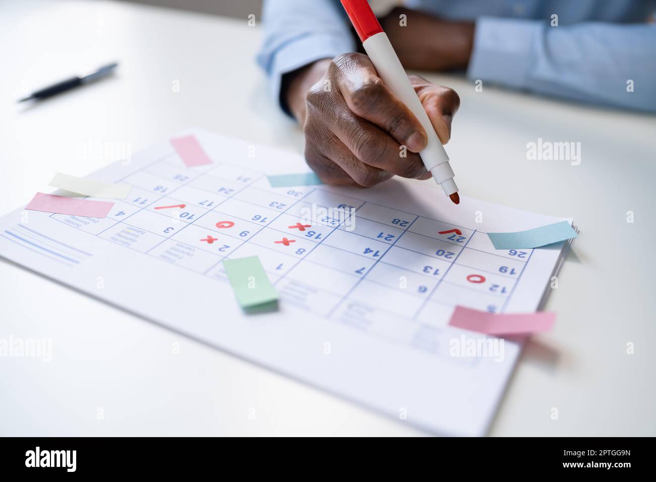 Hands young man holding calendar hi-res stock photography and images ...