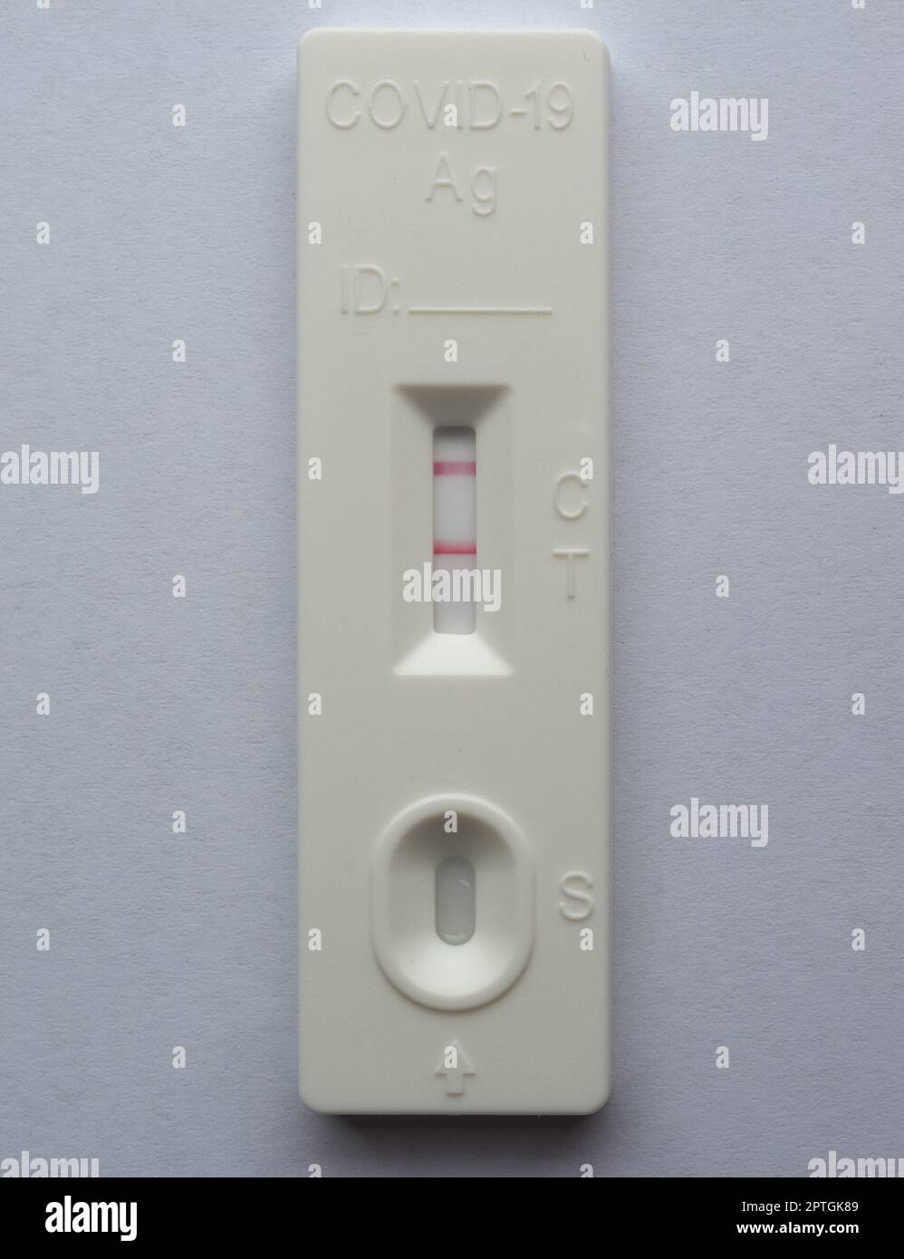 Positive Covid 19 antigen rapid test specimen well Stock Photo - Alamy