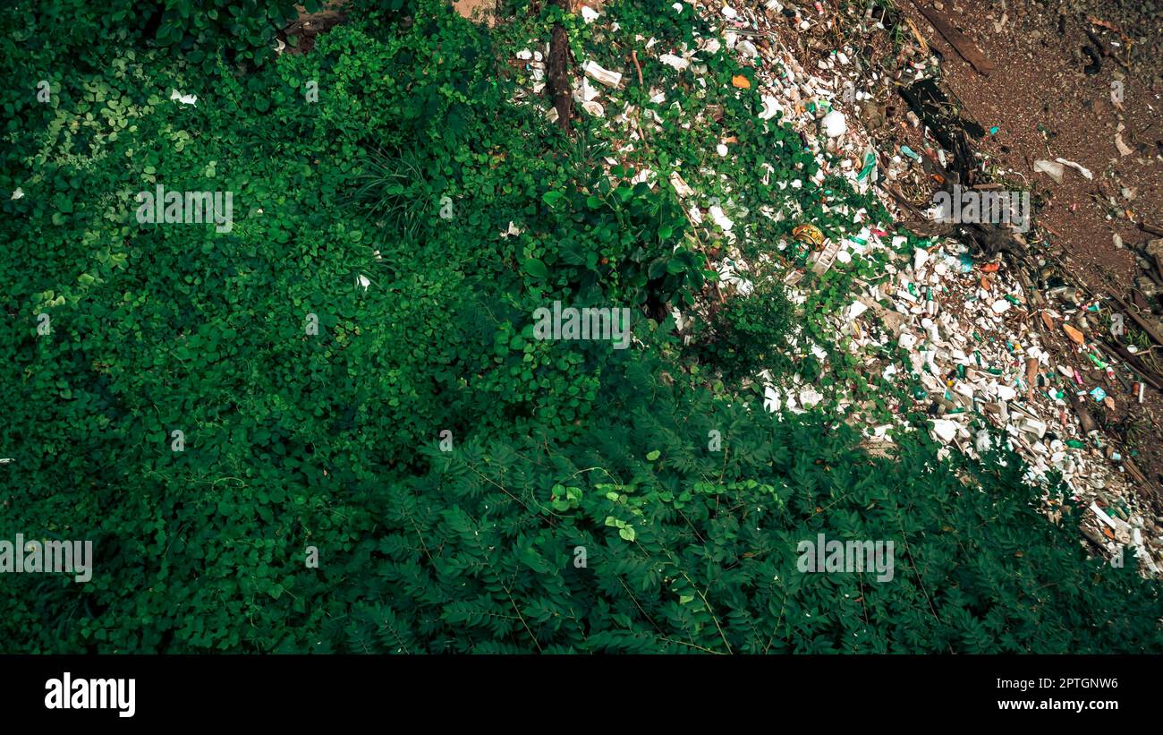 environmental damage of garbage in the nature. garbage and smog in ...