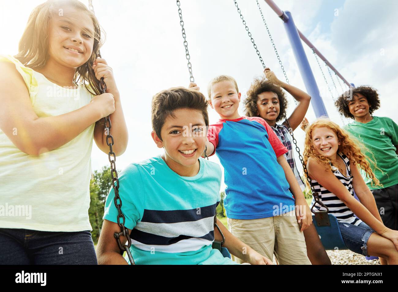 Of course were the coolest kids around. Portrait of a group of young ...