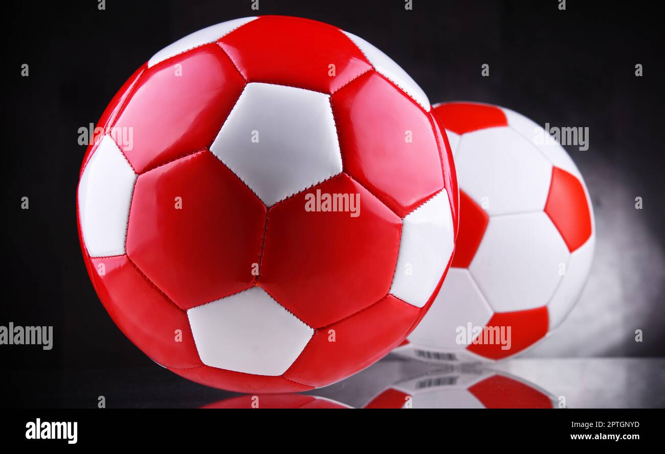 Composition with two leather soccer balls Stock Photo - Alamy