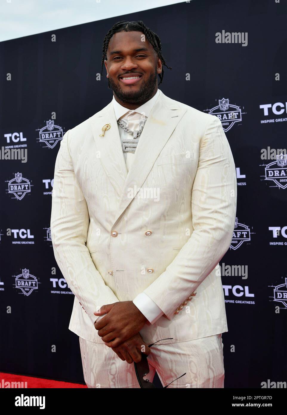 Paris Johnson Jr. walks the red carpet of the 2023 NFL Draft at the ...