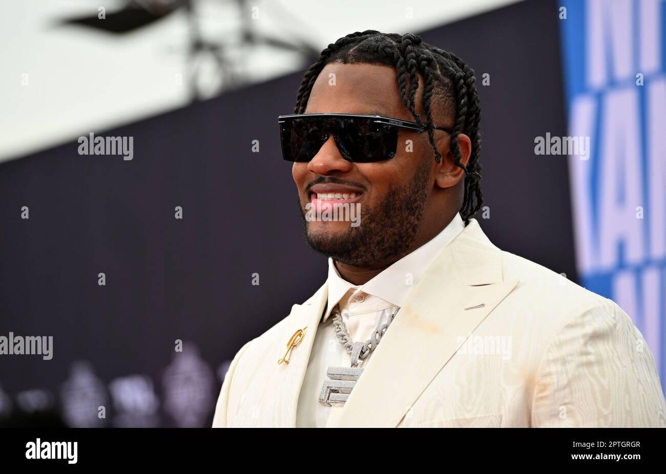 Paris Johnson Jr. walks the red carpet of the 2023 NFL Draft at the ...