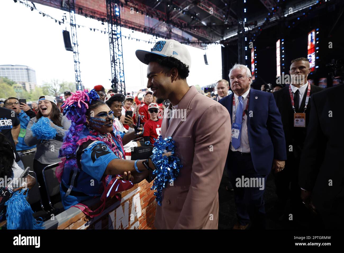 Alabama Quarterback Bryce Young poses with Carolina Panther fans after ...