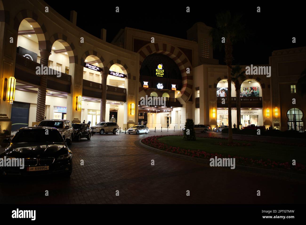 Qatar, Doha by night. Mood of the modern and traditional Stock Photo ...