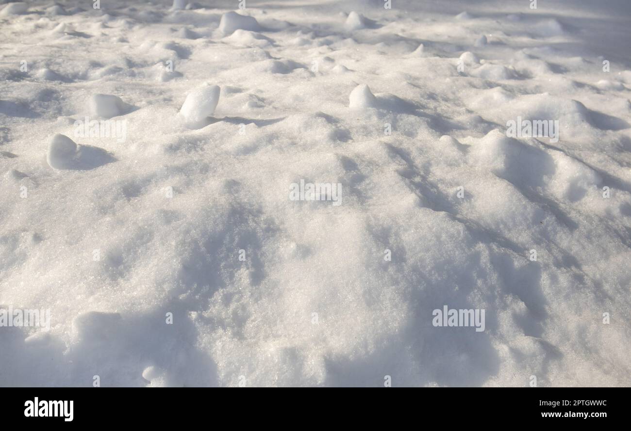 Snow texture, snowdrifts under sunlight with shadows Stock Photo - Alamy