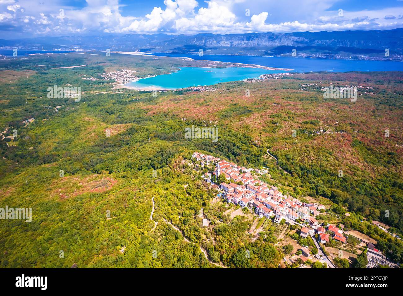 Historic town of Dobrinj and turquoise Soline bay aerial panoramic view, Island of Krk, Kvarner ...