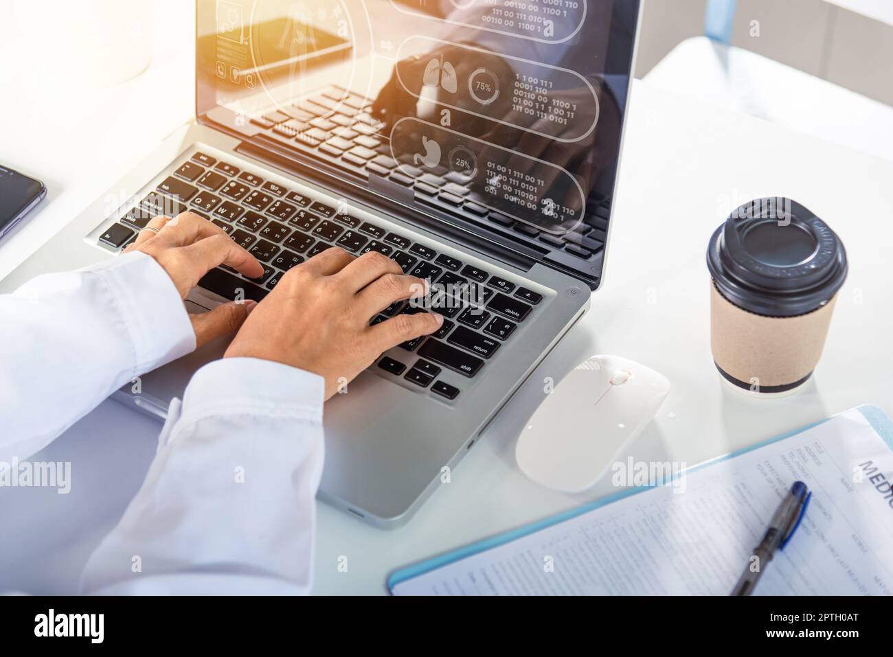 Hands of female doctor wear uniform in hospital she typing information ...