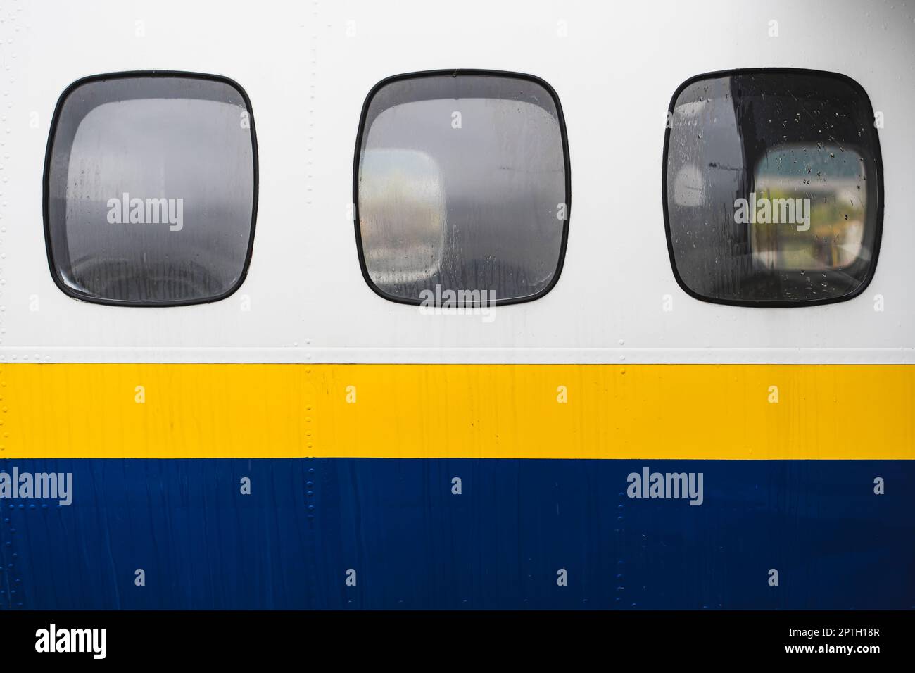 Airplane windows from the outside, at the airport Stock Photo - Alamy