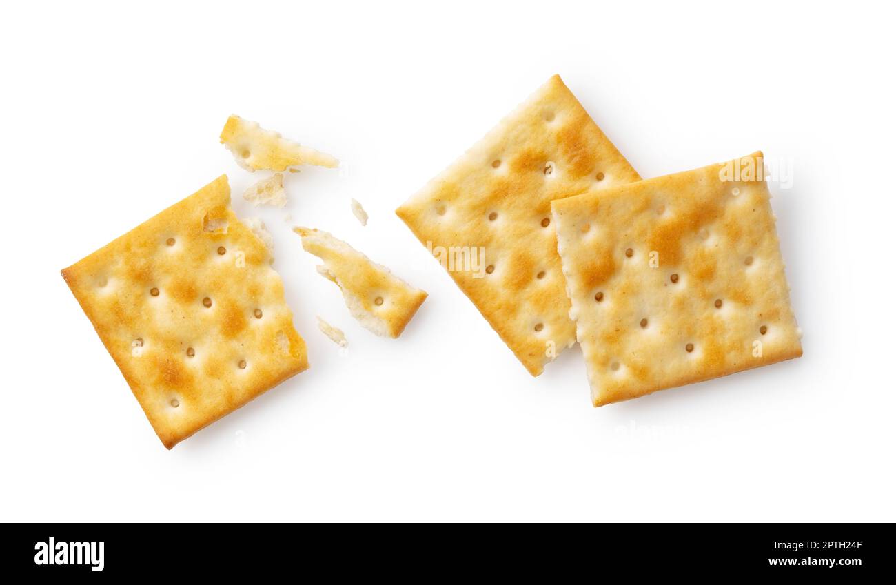 Broken crackers placed on a white background. Viewed from above Stock ...