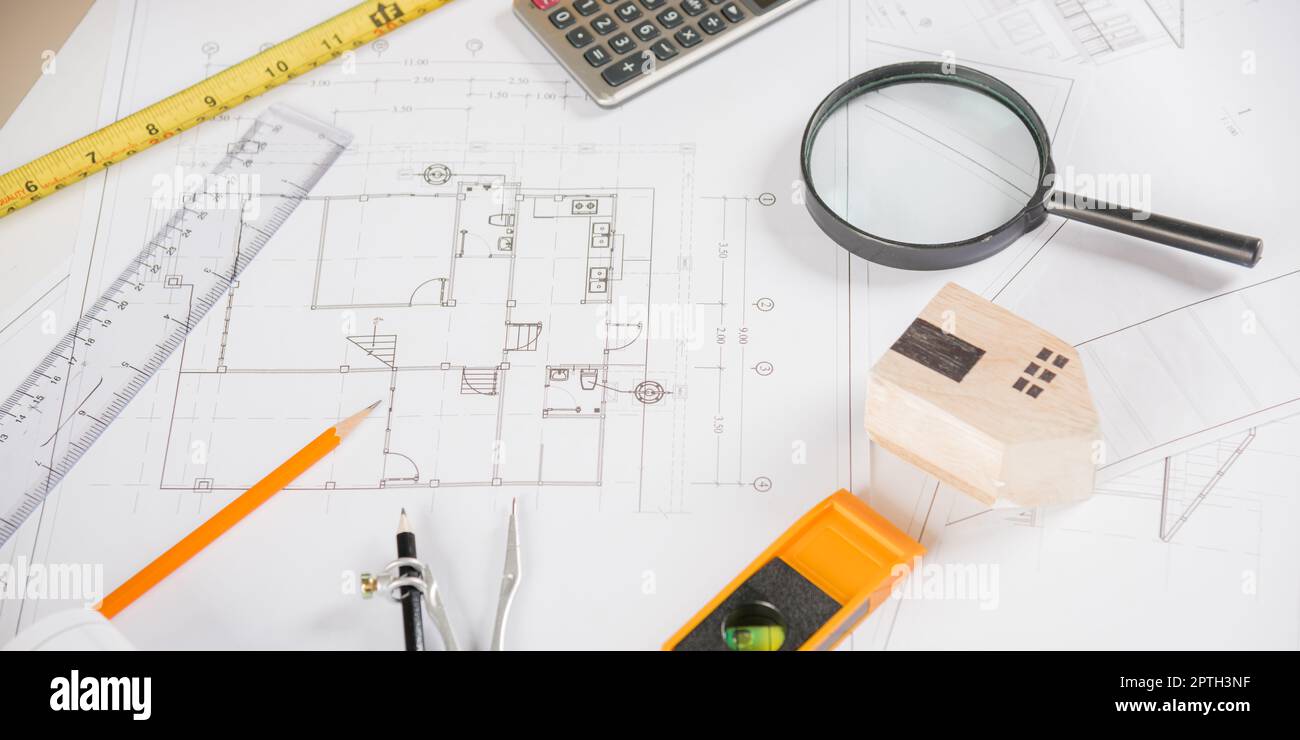Architectural project workplace. Top view of house plan blueprint paper ...