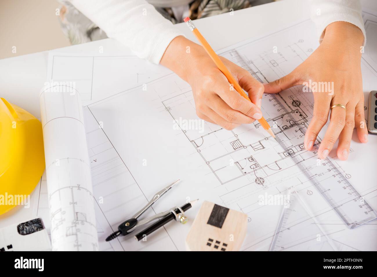 Architectural project workspace. Top view of architect drawing with ...