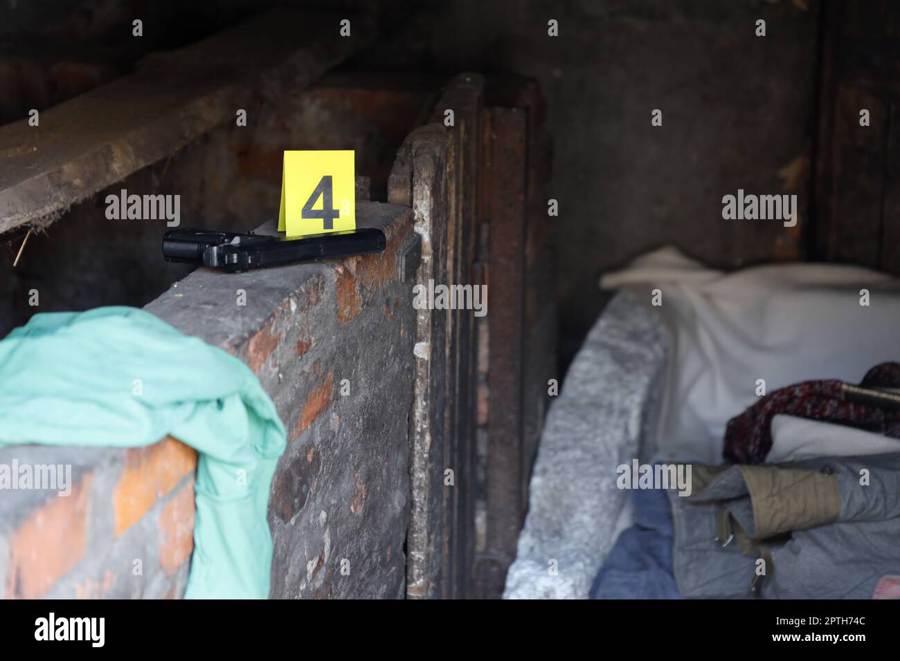Evidence with yellow CSI marker for evidence numbering on the ...