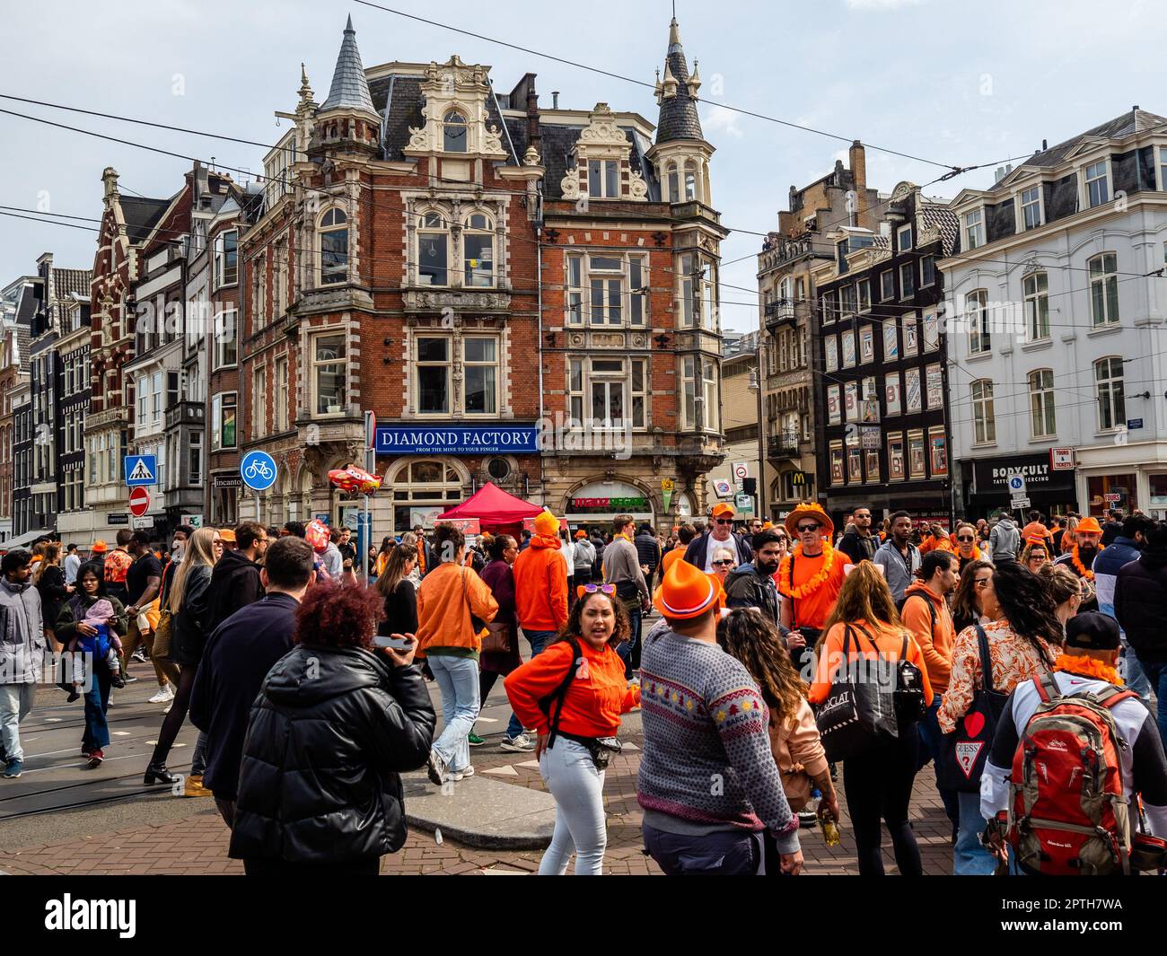 Amsterdam, Netherlands. 27th Apr, 2023. People wearing orange clothes ...
