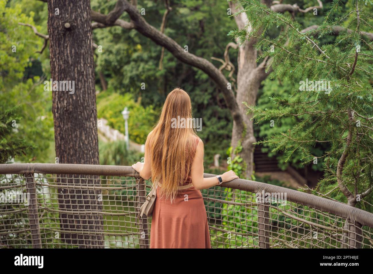 Woman tourist in Rope bridge in Yildiz Park. Besiktas, Istanbul, Turkey ...