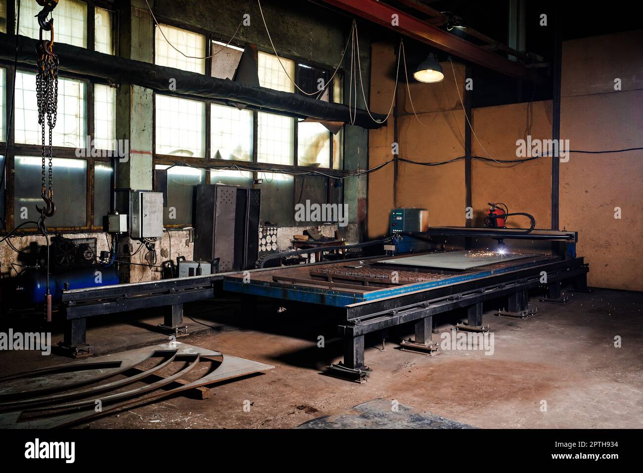 interior of a machine hall at an old industrial factory Stock Photo - Alamy
