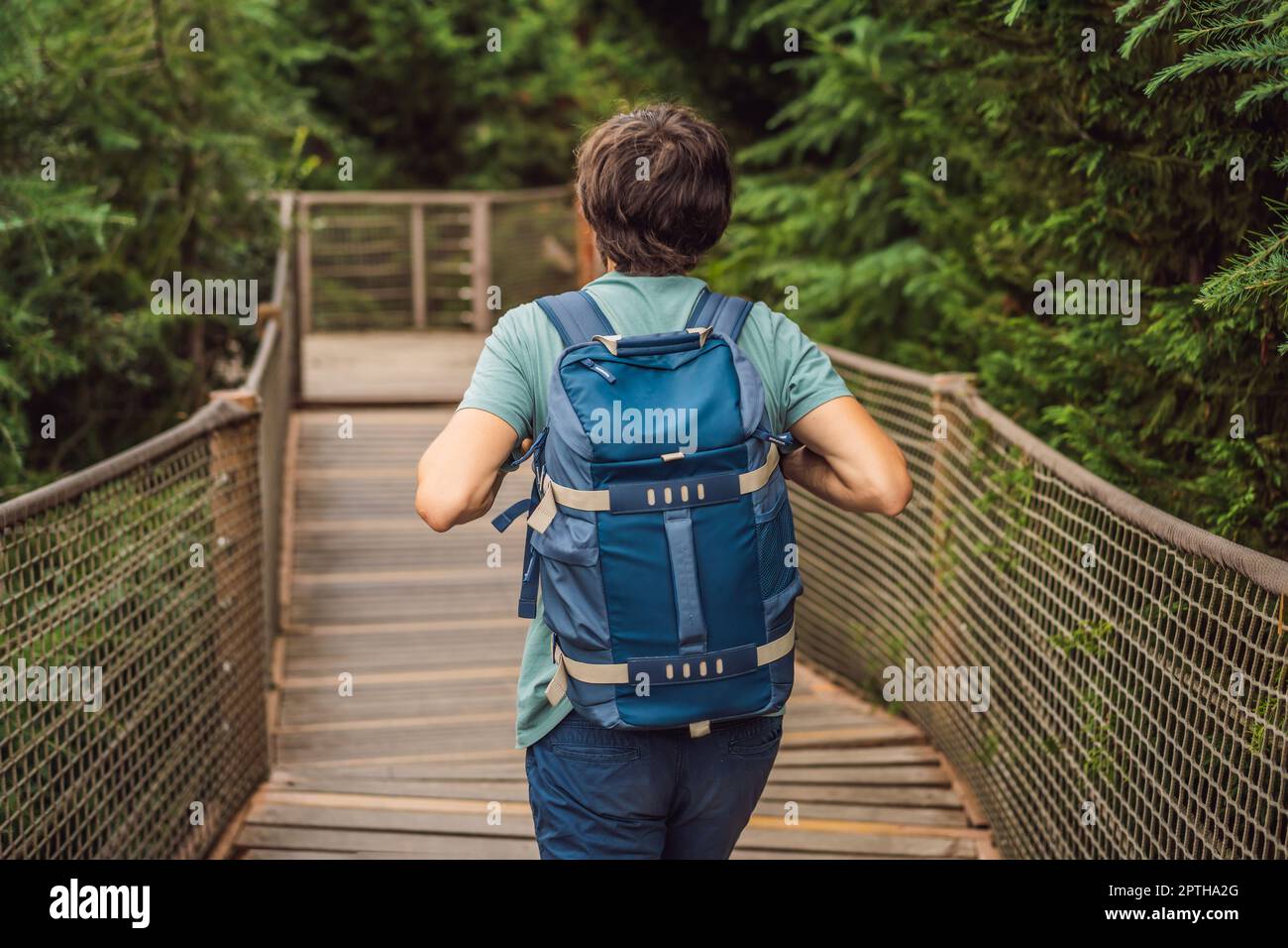 Man tourist in Rope bridge in Yildiz Park. Besiktas, Istanbul, Turkey ...