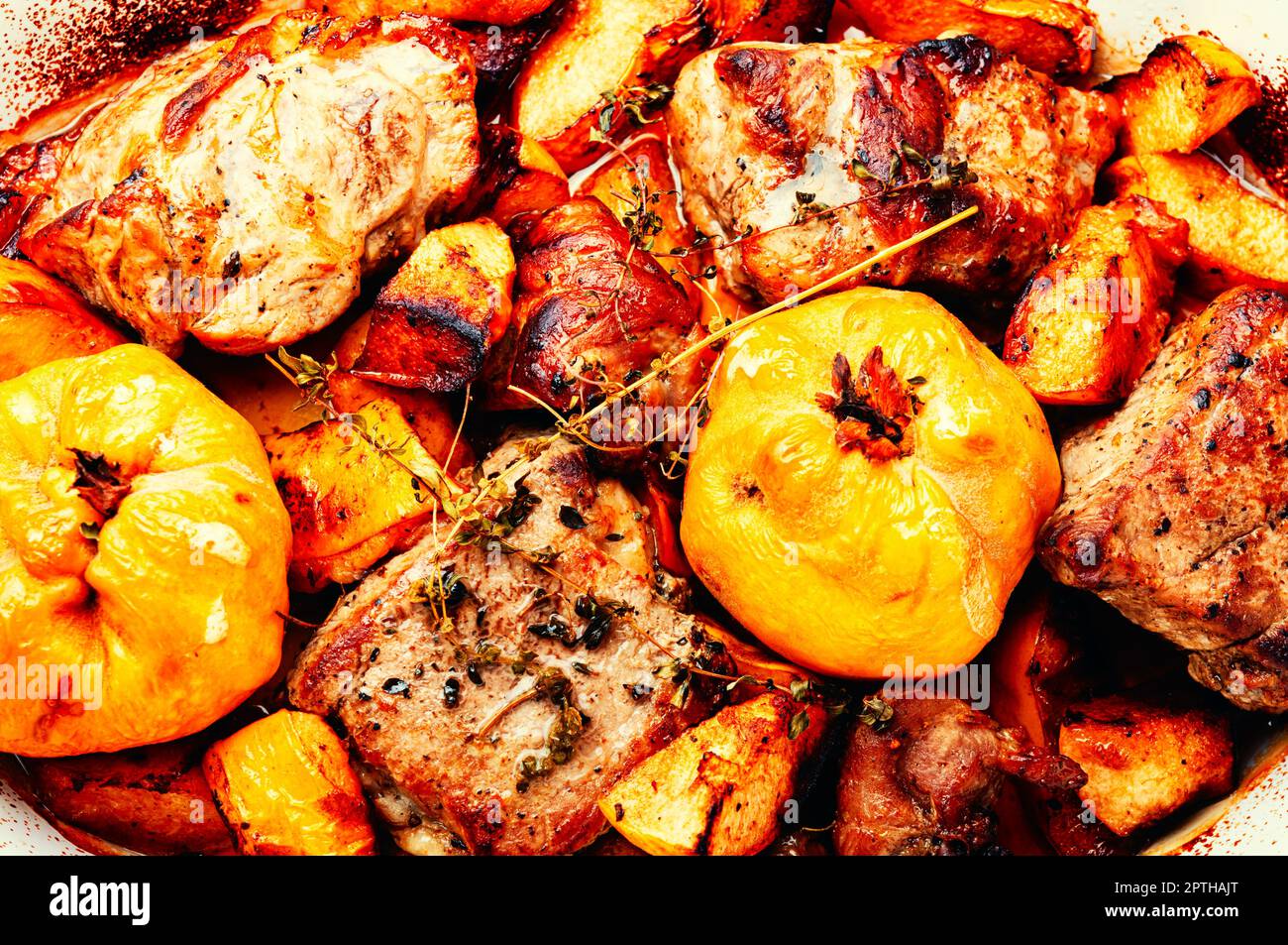 Delicious meat cooked with autumn fruits. Food background Stock Photo ...